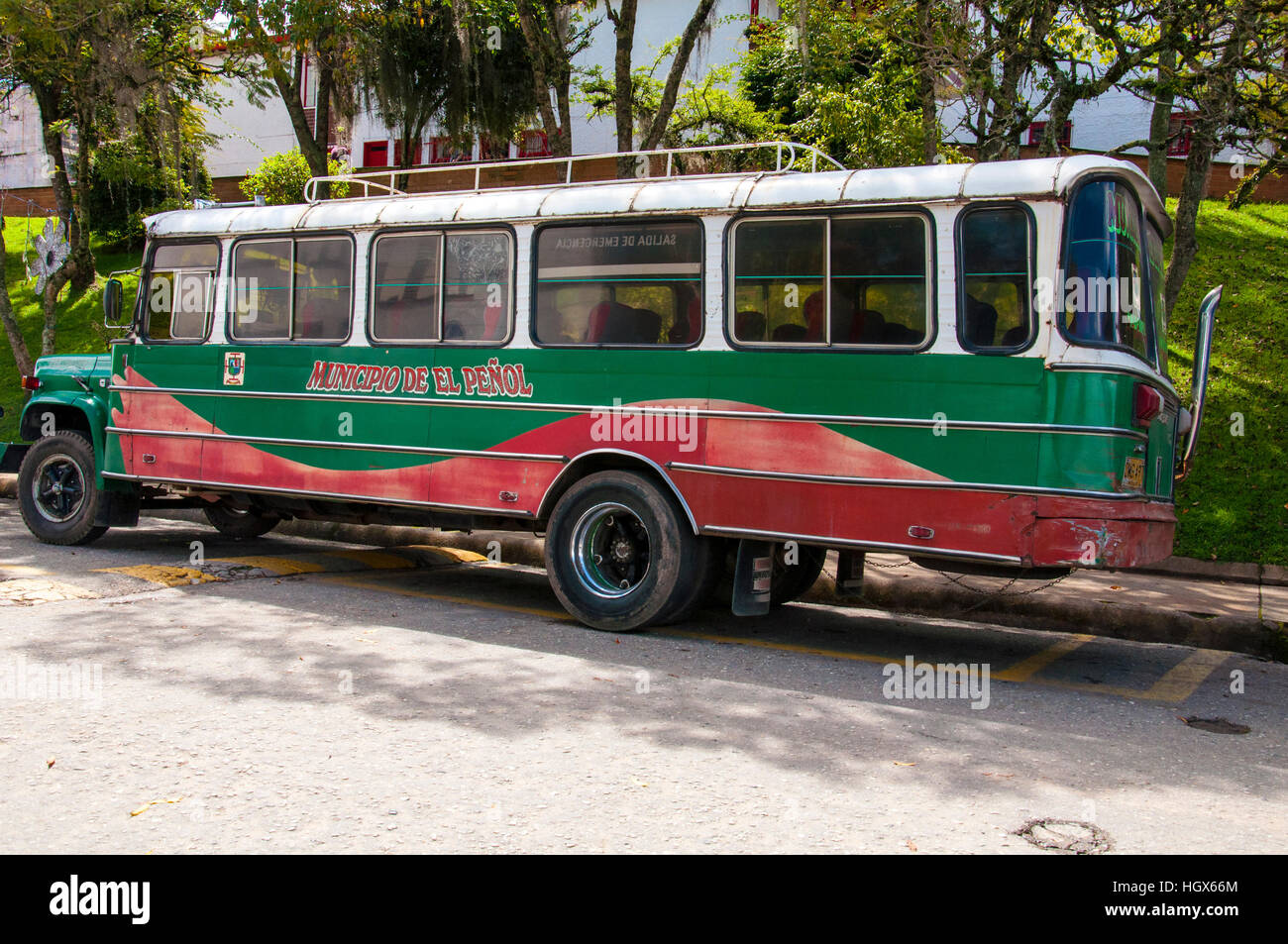 Colourful local bus stops on the street in the El Penol, Medellin ...