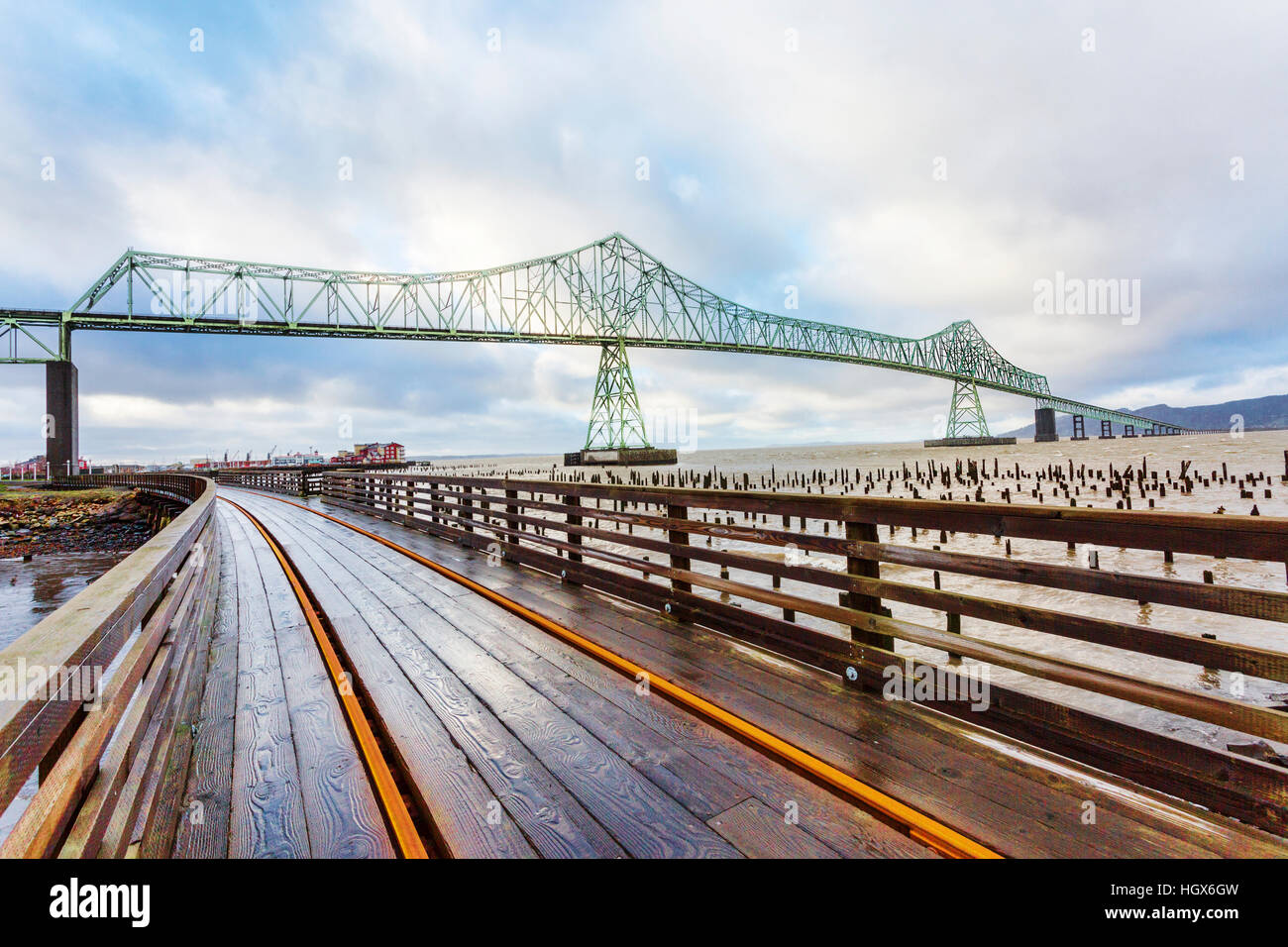 Trolley tracks, boardwalk, and Astoria-Megler Bridge, Columbia River, a ...