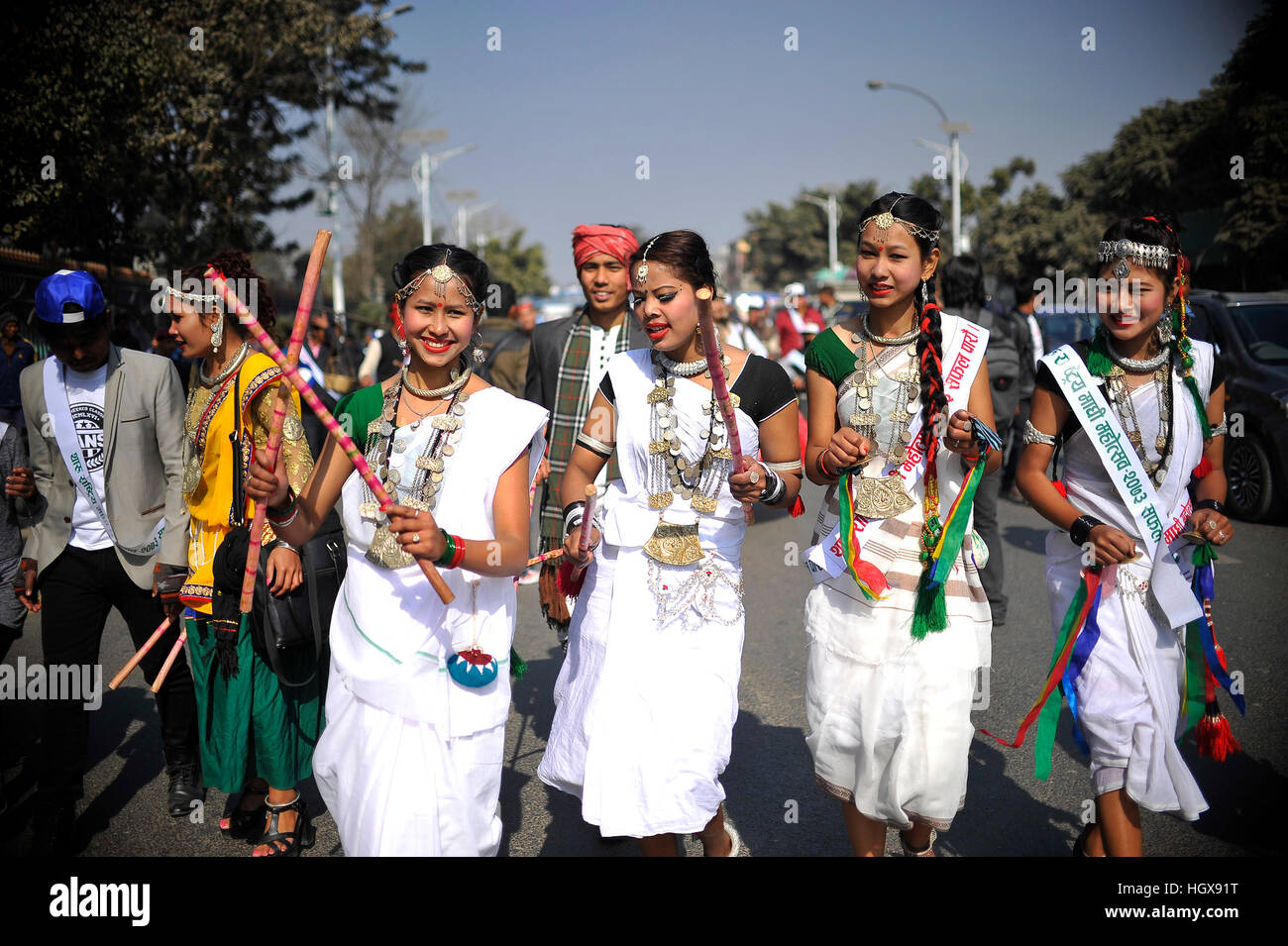 Kathmandu, Nepal. 14th Jan, 2017. Nepalese Tharu community woman plays traditional instruments ...