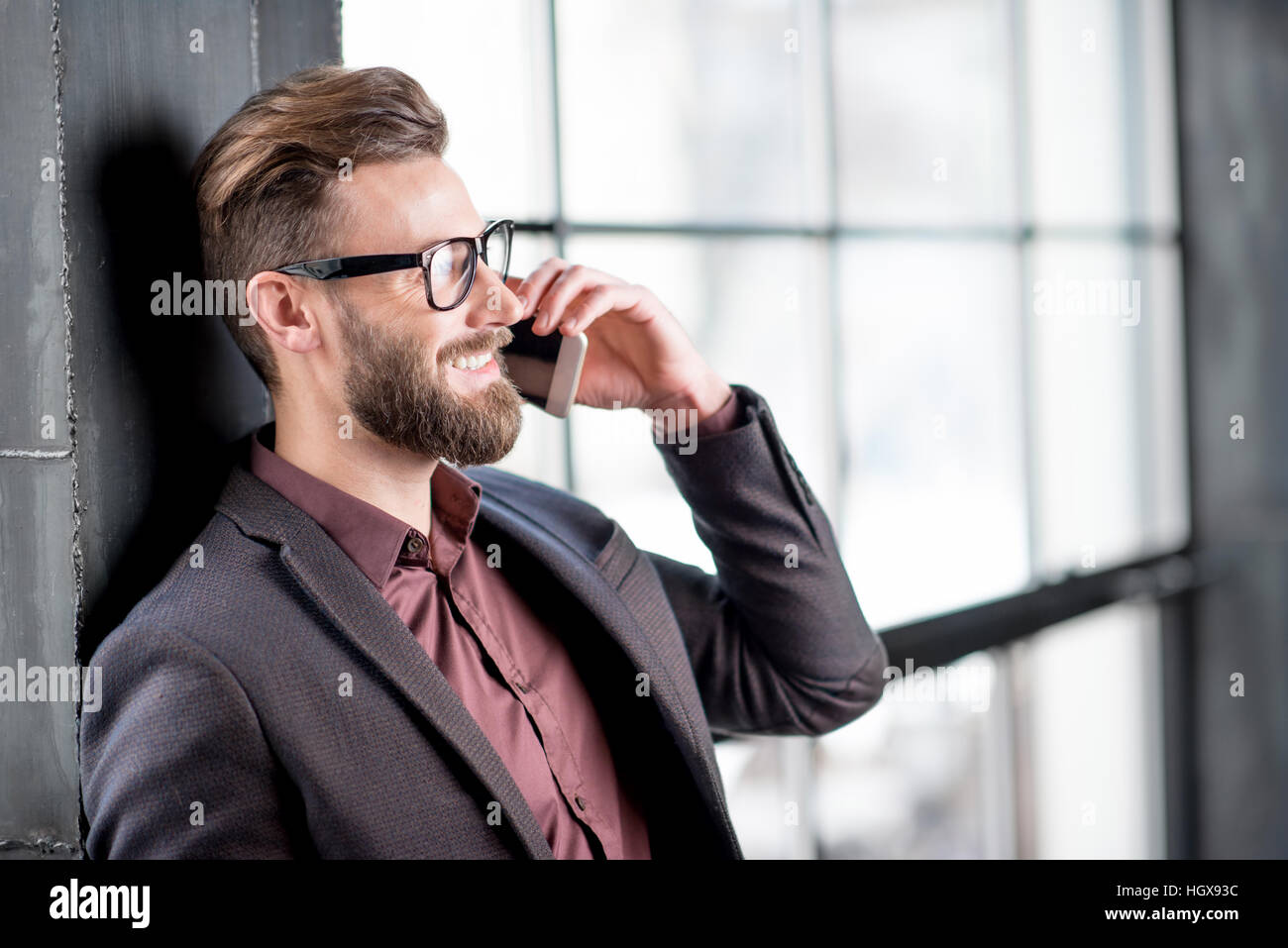 Businessman with smart phone Stock Photo - Alamy