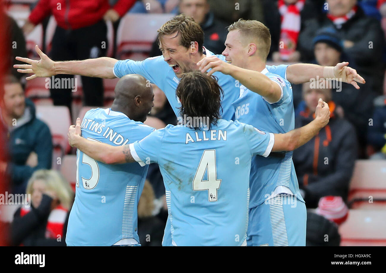 Stoke City's Peter Crouch celebrates scoring his side's third goal of ...