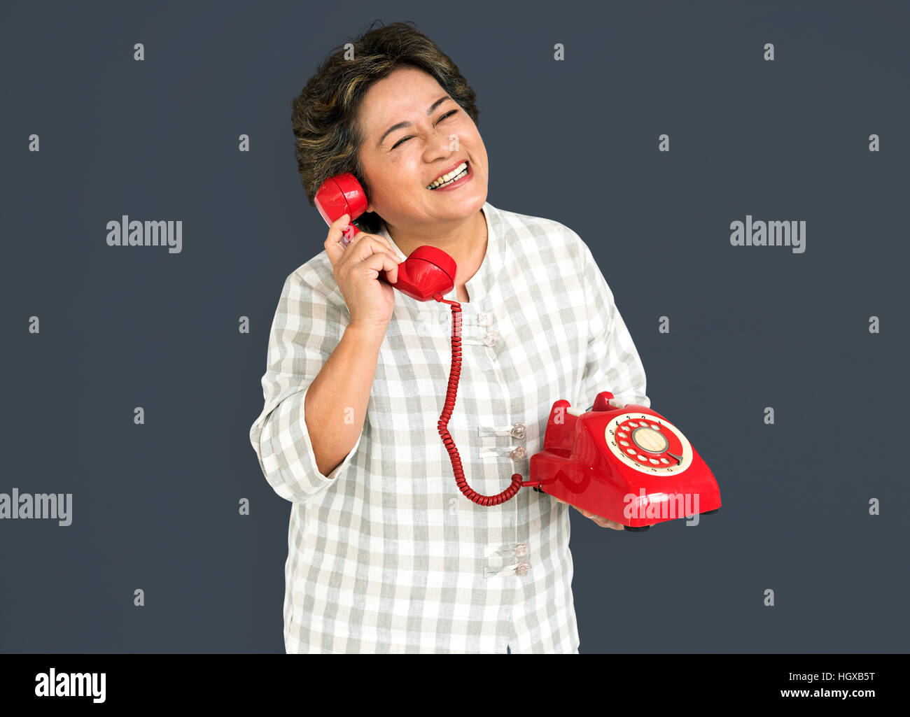 Vintage telephone with lady hi-res stock photography and images - Alamy