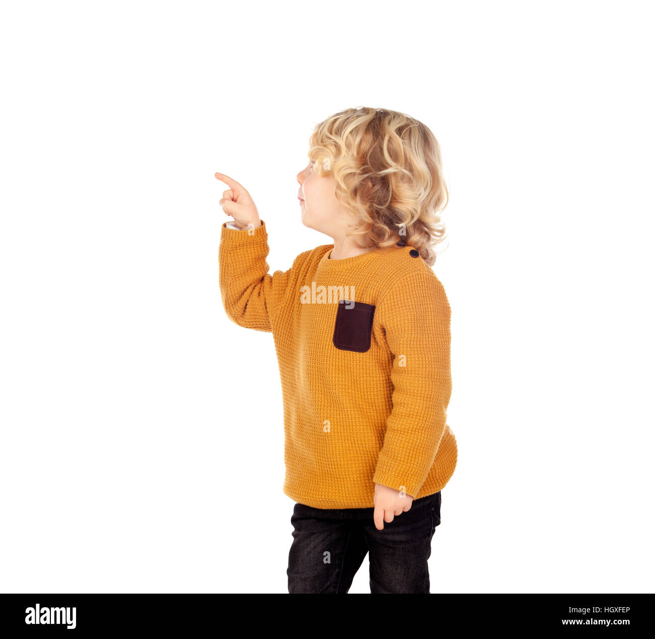 Cute kid pointing with his finger isolated on white background Stock ...