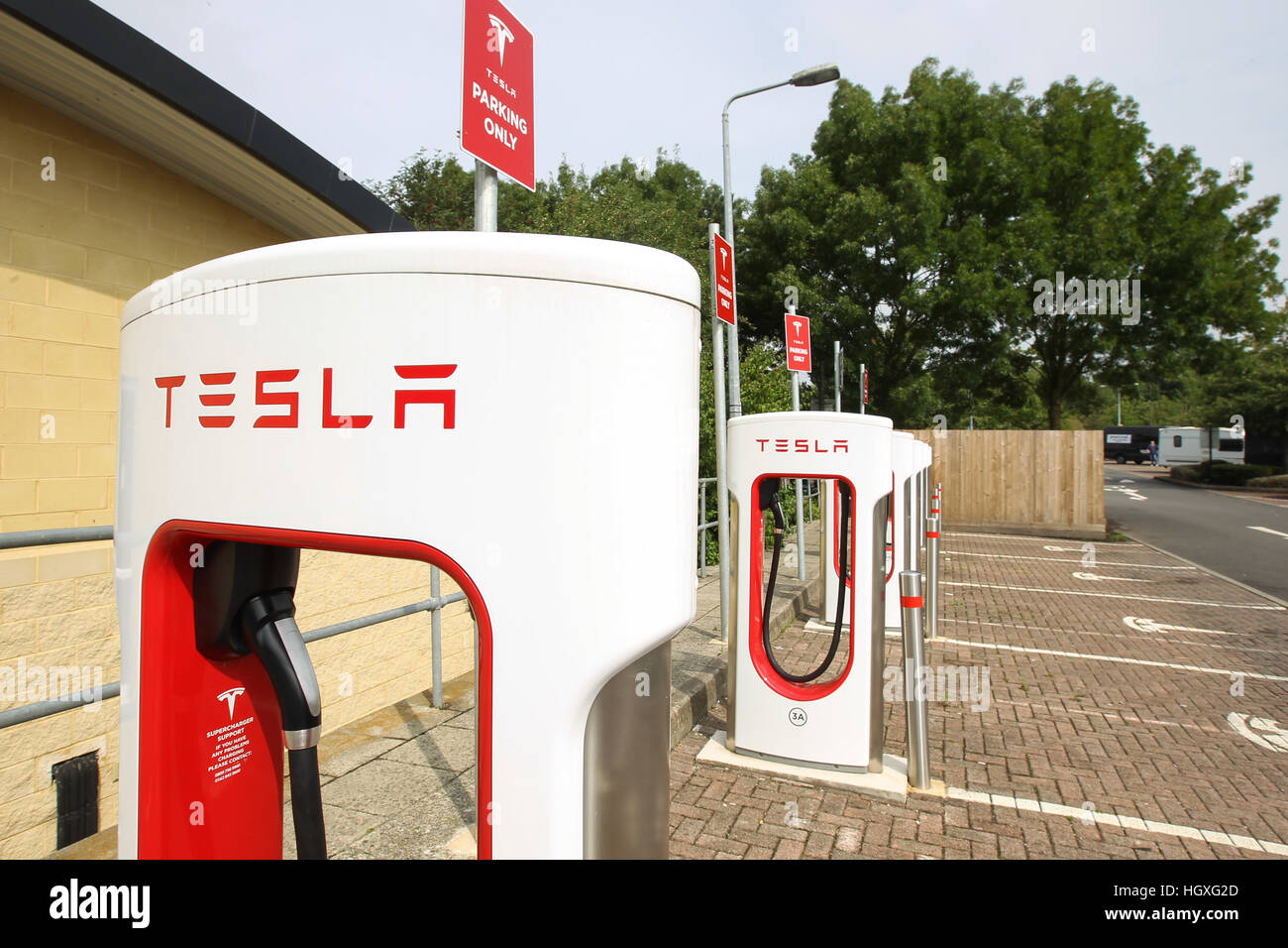 Empty Tesla electric car vehicle charging stations, England, UK Stock ...
