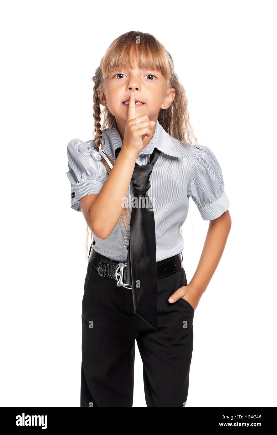 Little girl showing hand silence sign Stock Photo - Alamy