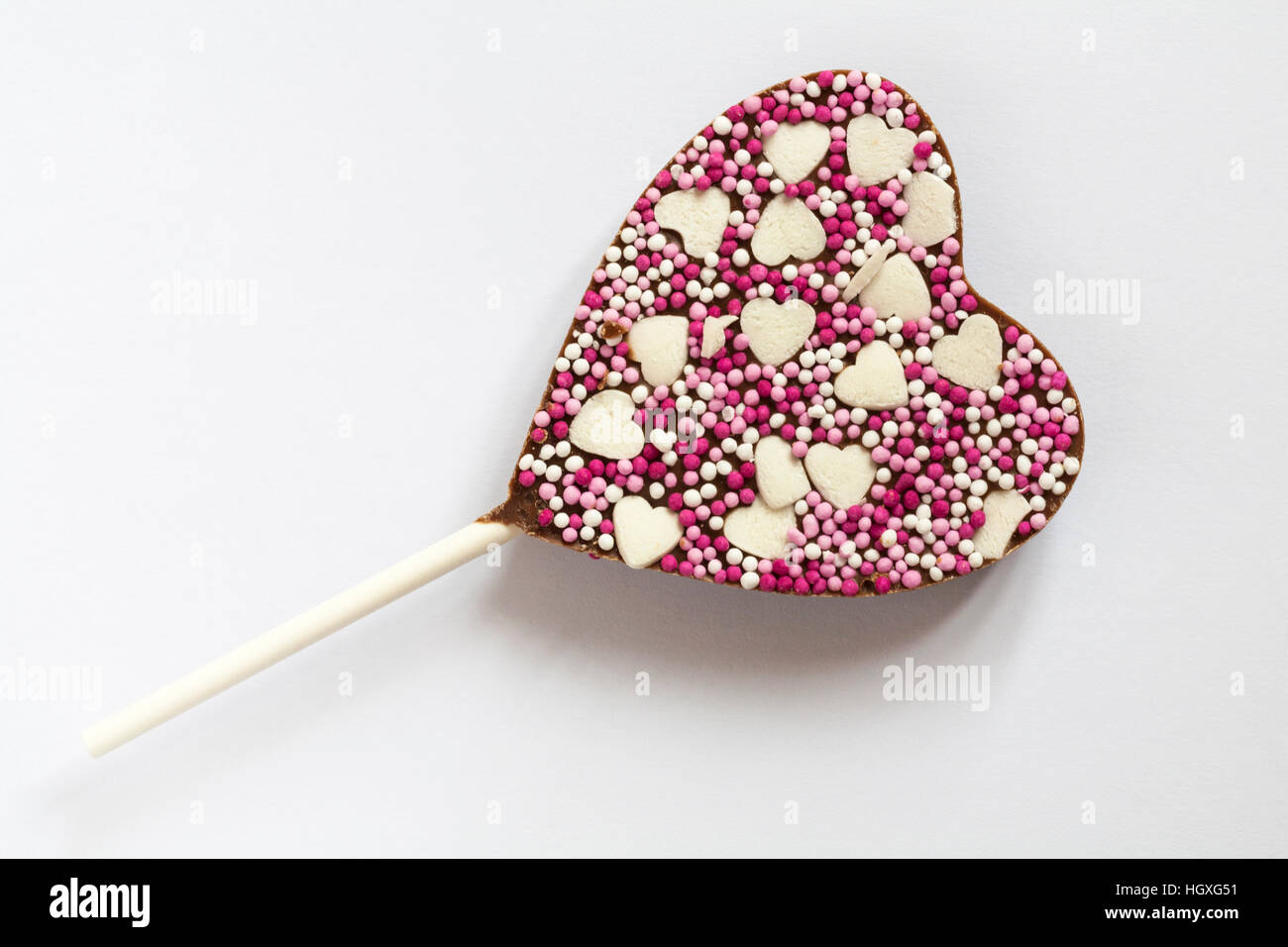 heart shaped chocolate lolly lollipop isolated on white background ...
