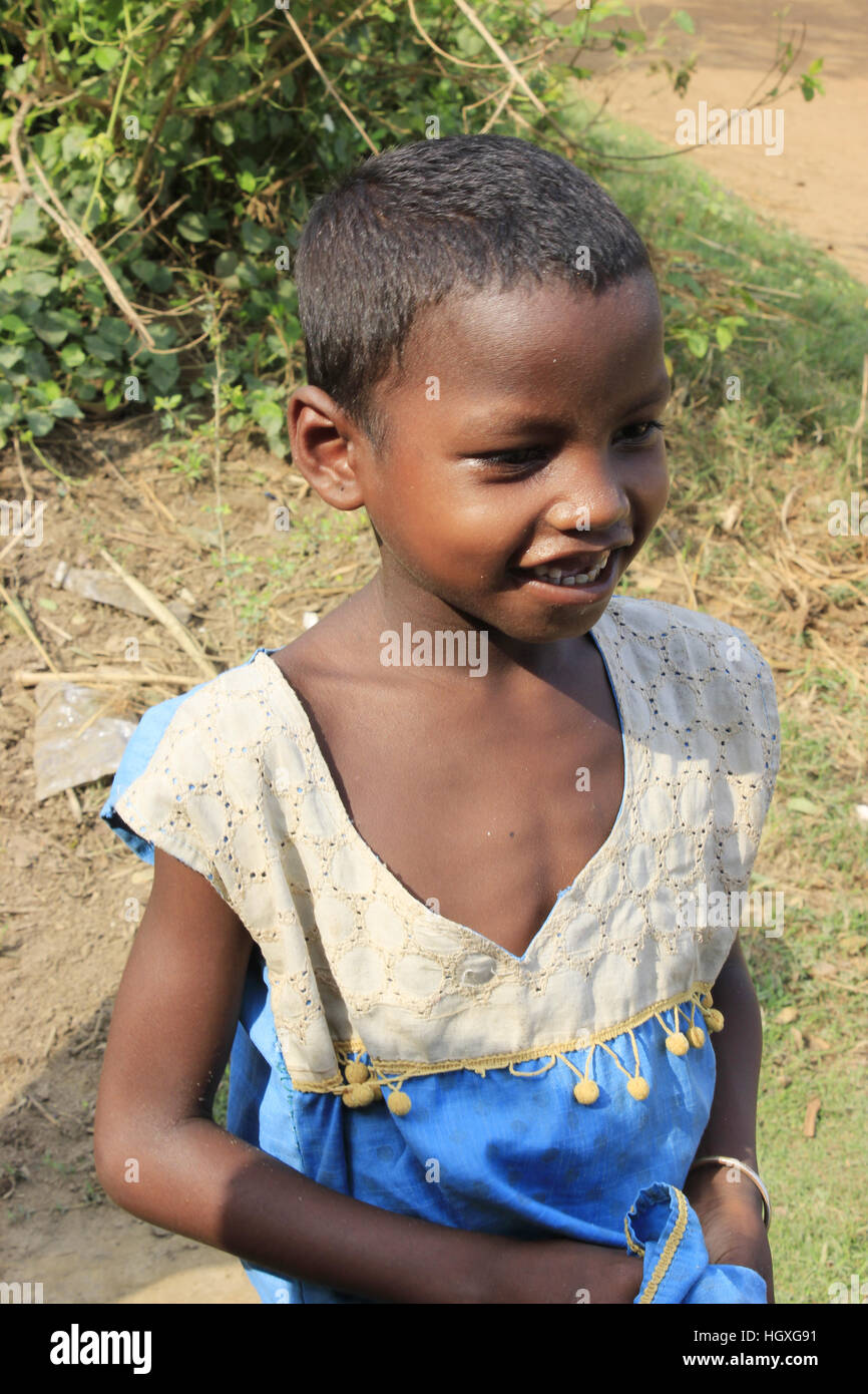 Portrait of a poor little innocent girl. Wow moment. Homeless kid Stock ...