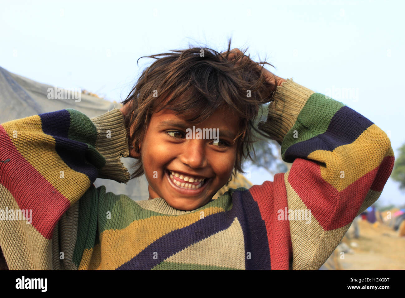 Portrait of a poor little innocent girl. Wow moment. Homeless kid Stock ...