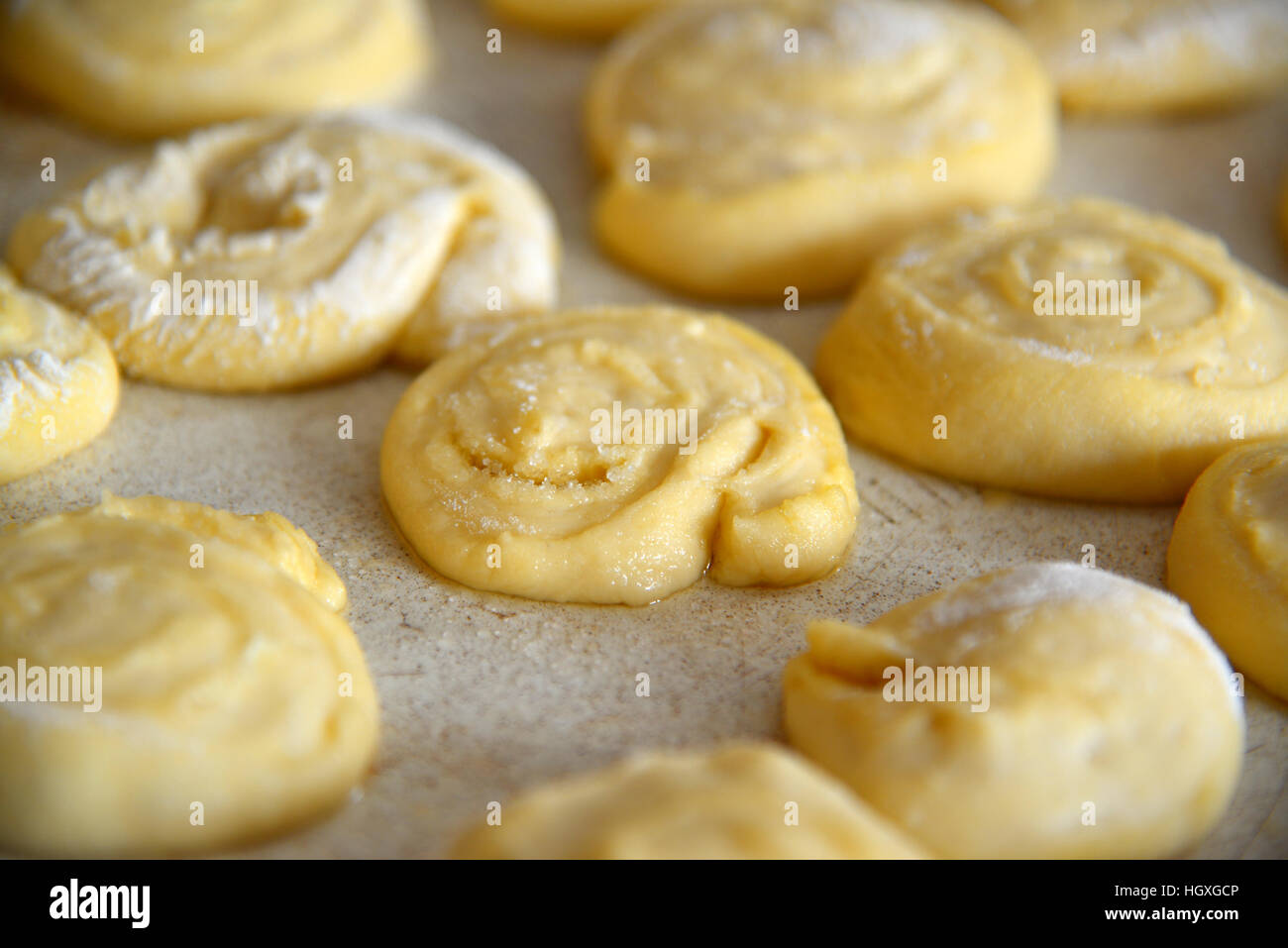 Sweet rolls of biscuit dough uncooked Stock Photo - Alamy