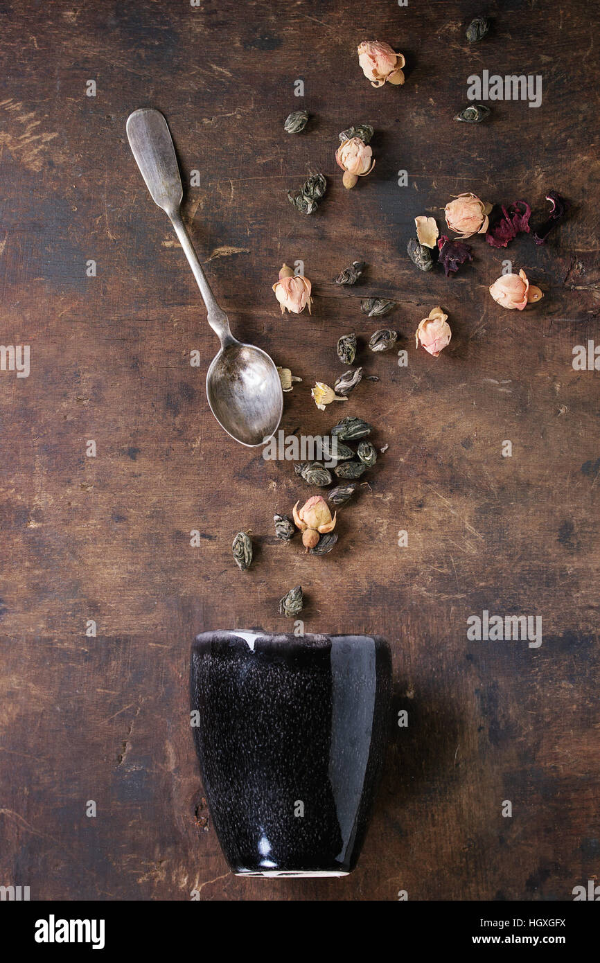Variety of dry tea with teapot Stock Photo - Alamy
