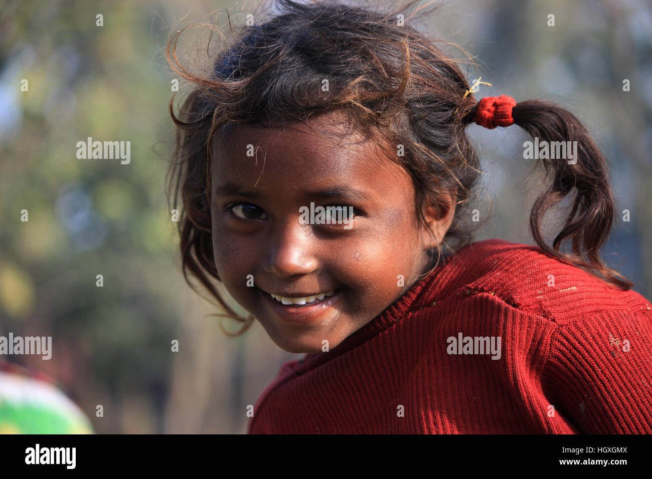 Portrait of a poor little innocent girl. Wow moment. Homeless kid Stock ...