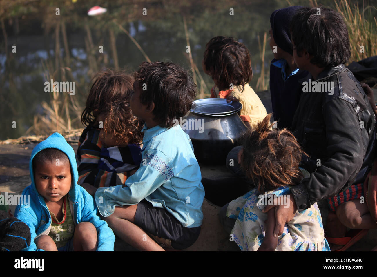 Homeless kids. Poor little vagabond children in India Stock Photo - Alamy