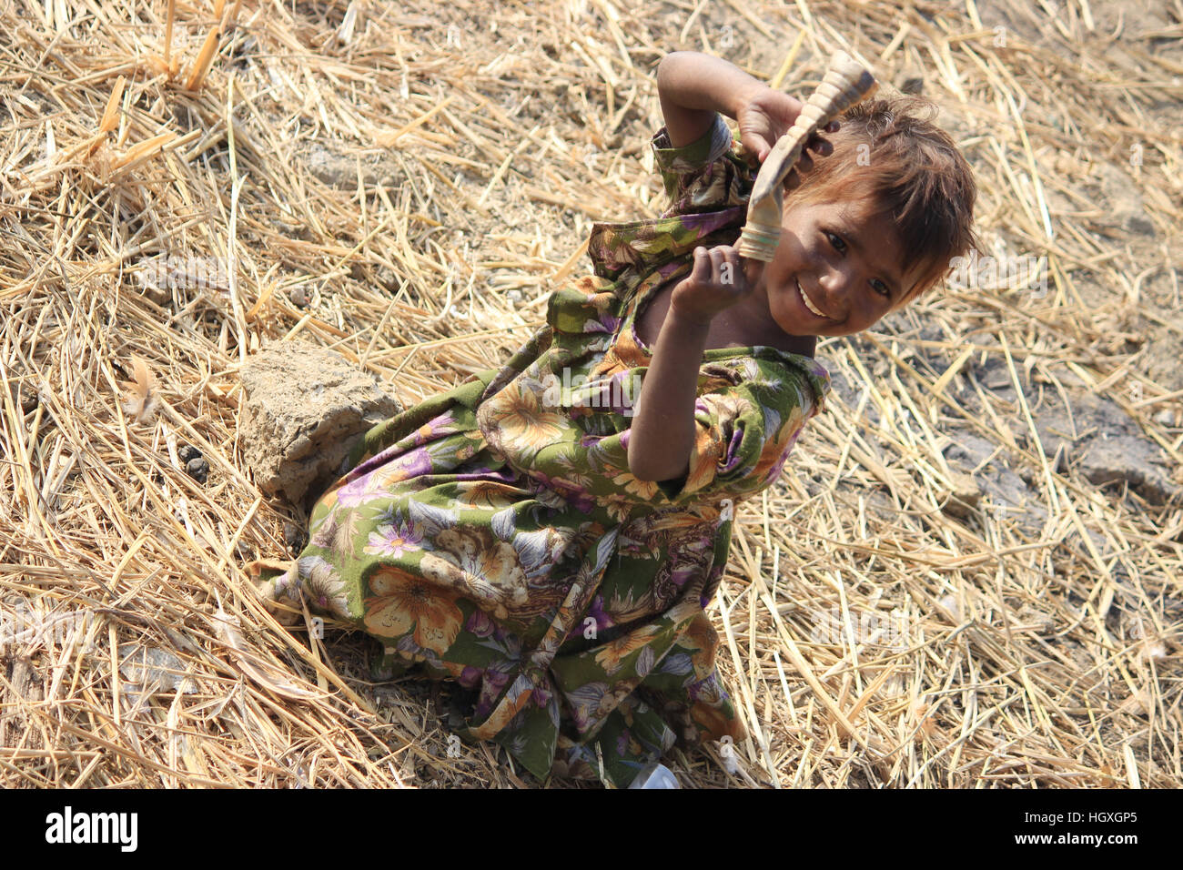 Portrait of a poor little innocent girl. Wow moment. Homeless kid Stock ...