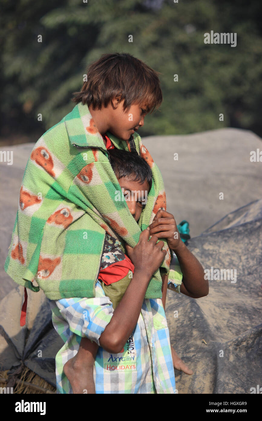 Homeless kids. Poor little vagabond children in India Stock Photo - Alamy