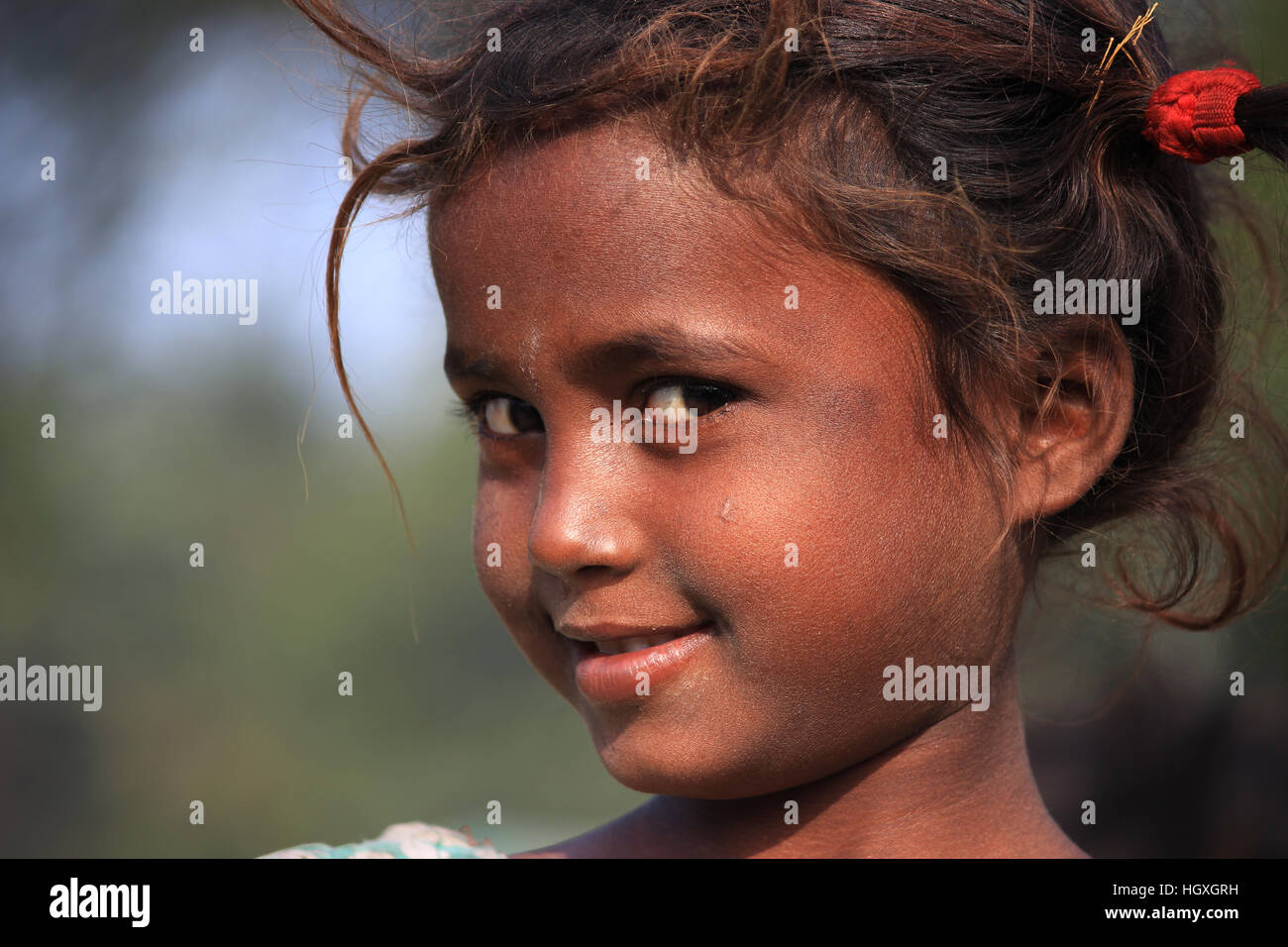 Portrait of a poor little innocent girl. Wow moment. Homeless kid Stock ...