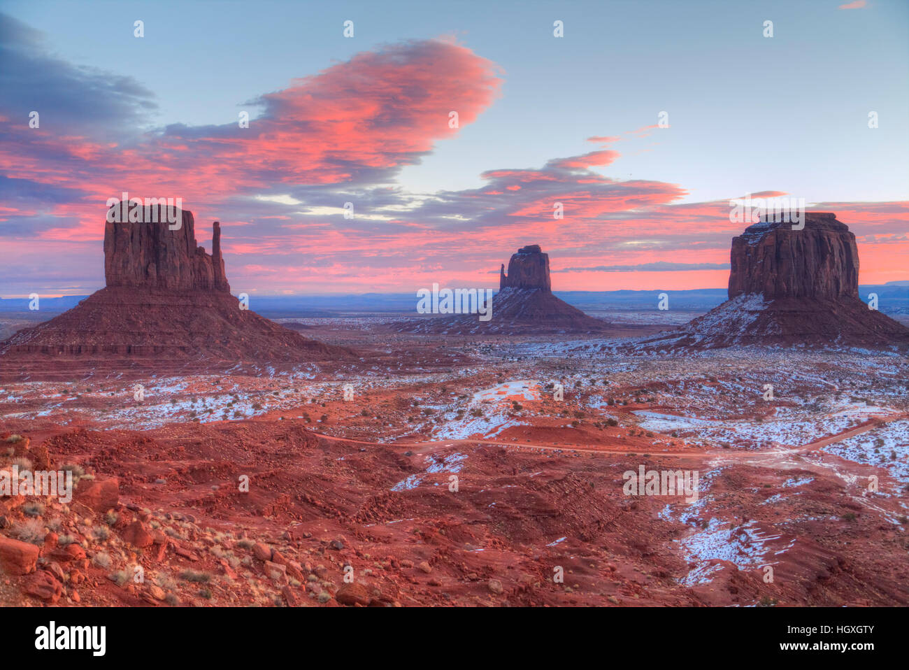 Sunrise, West (left) and East (center) Mitten Buttes, Merrick Butte ...