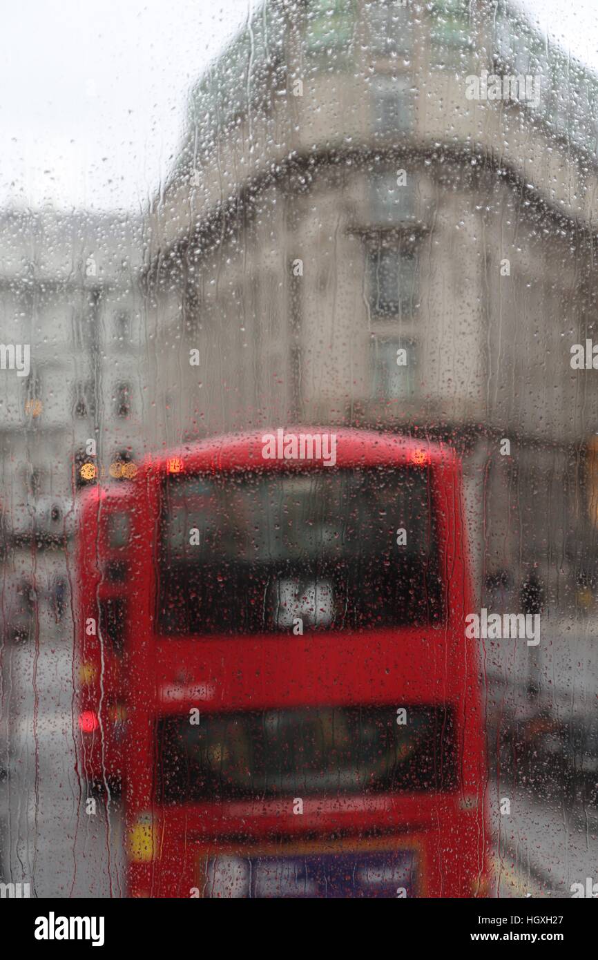 London's famous buses and its equally famous rain Stock Photo - Alamy