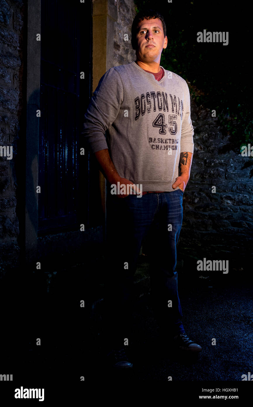 Male model outdoors at night portrait Stock Photo - Alamy