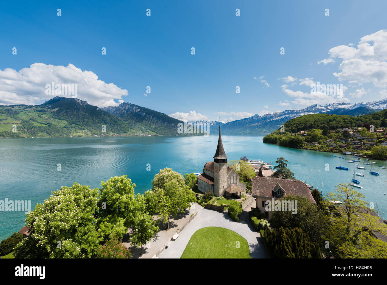 Spiez castle with sailboat on lake Thun in Bern, Switzerland Stock ...