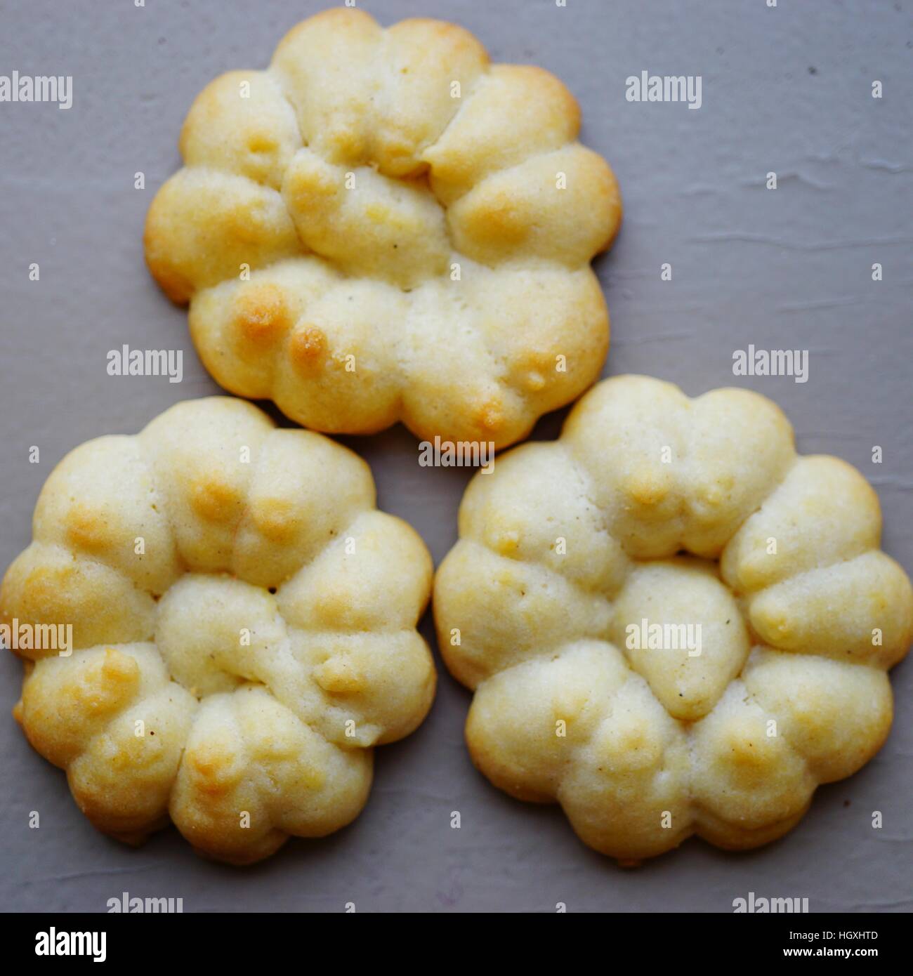 Homemade flower shaped butter cookies made with a cookie press Stock ...