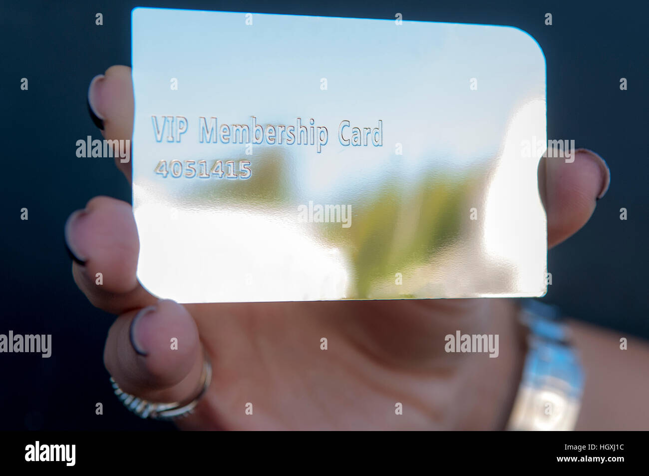 Hand holding vip member card hi-res stock photography and images - Alamy
