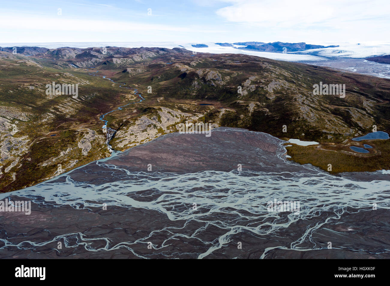 An outwash plain created by a river flowing with meltwater and sediment ...