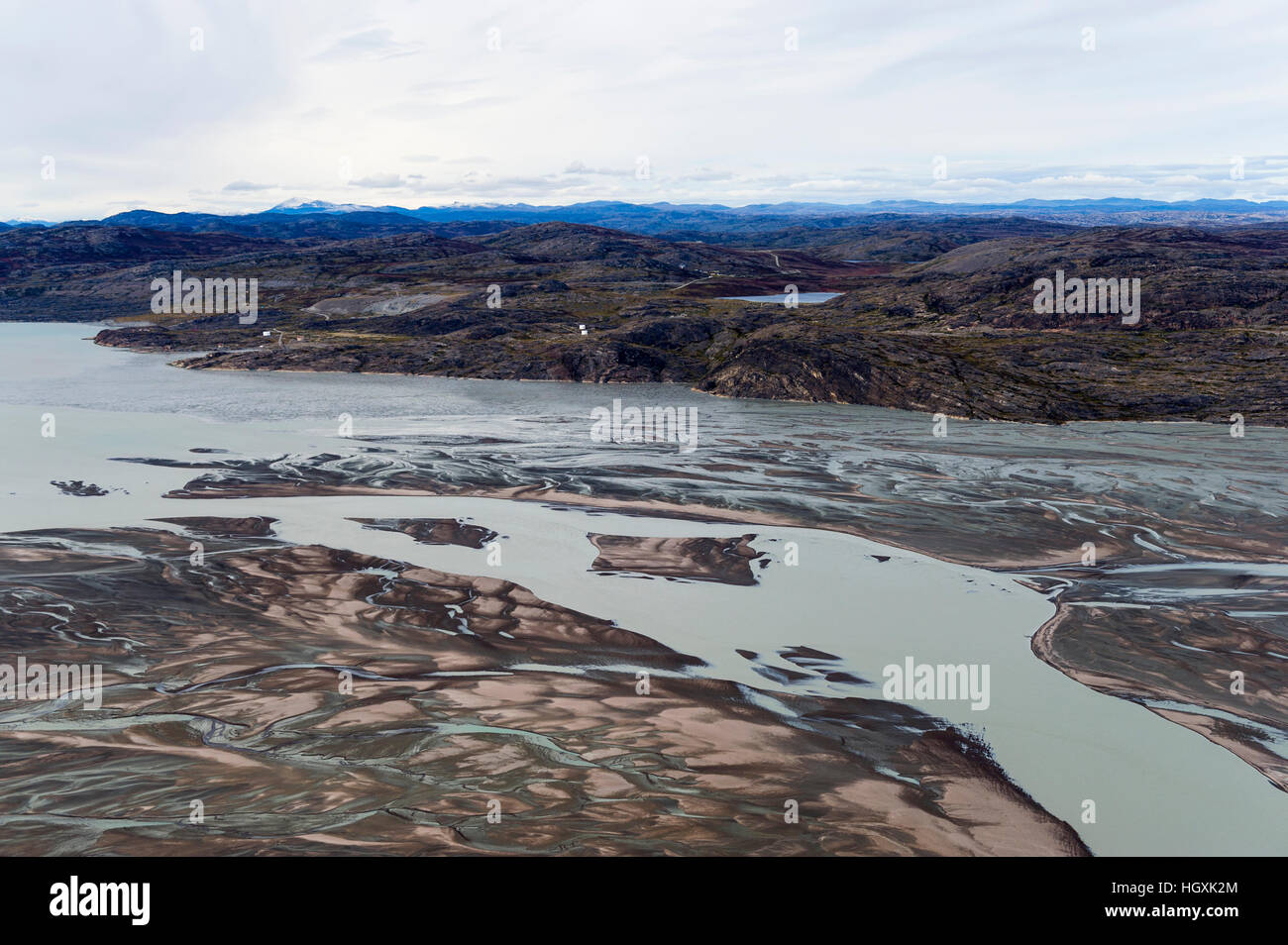 An outwash plain created by a river flowing with meltwater and sediment ...
