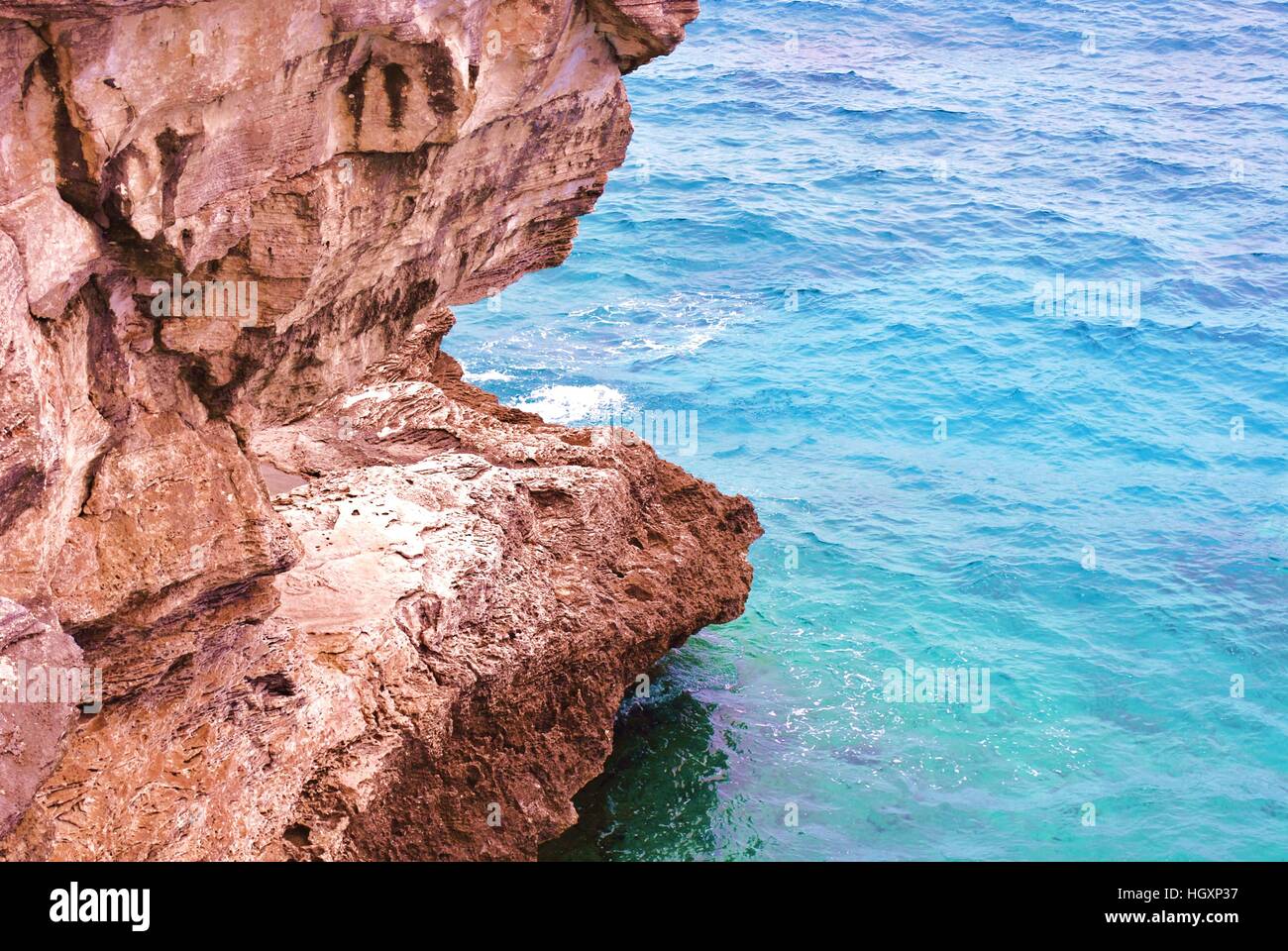 cliff face by the ocean Stock Photo - Alamy