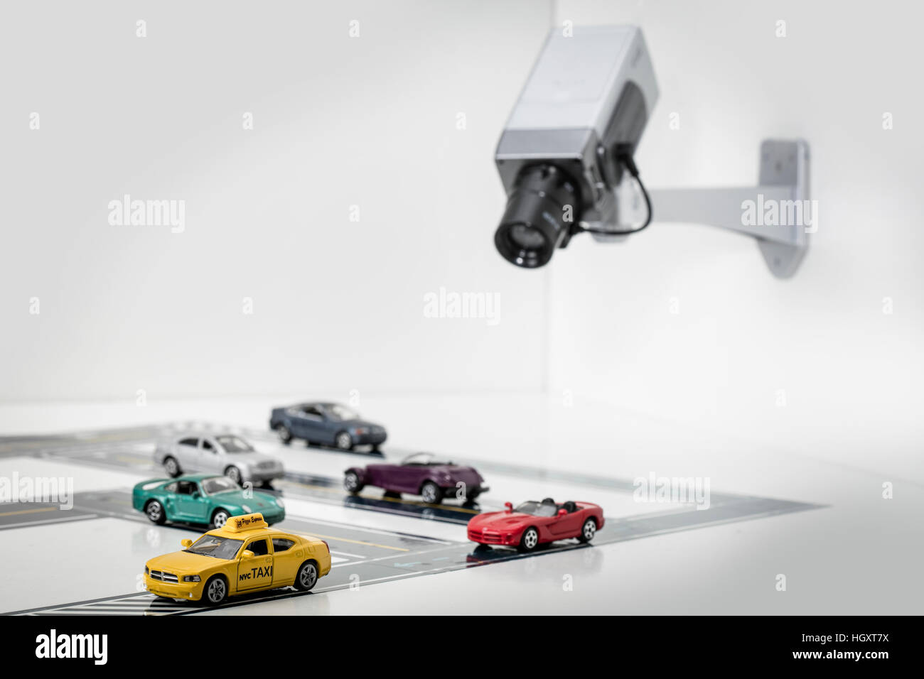 Surveillance camera watching cars Stock Photo - Alamy