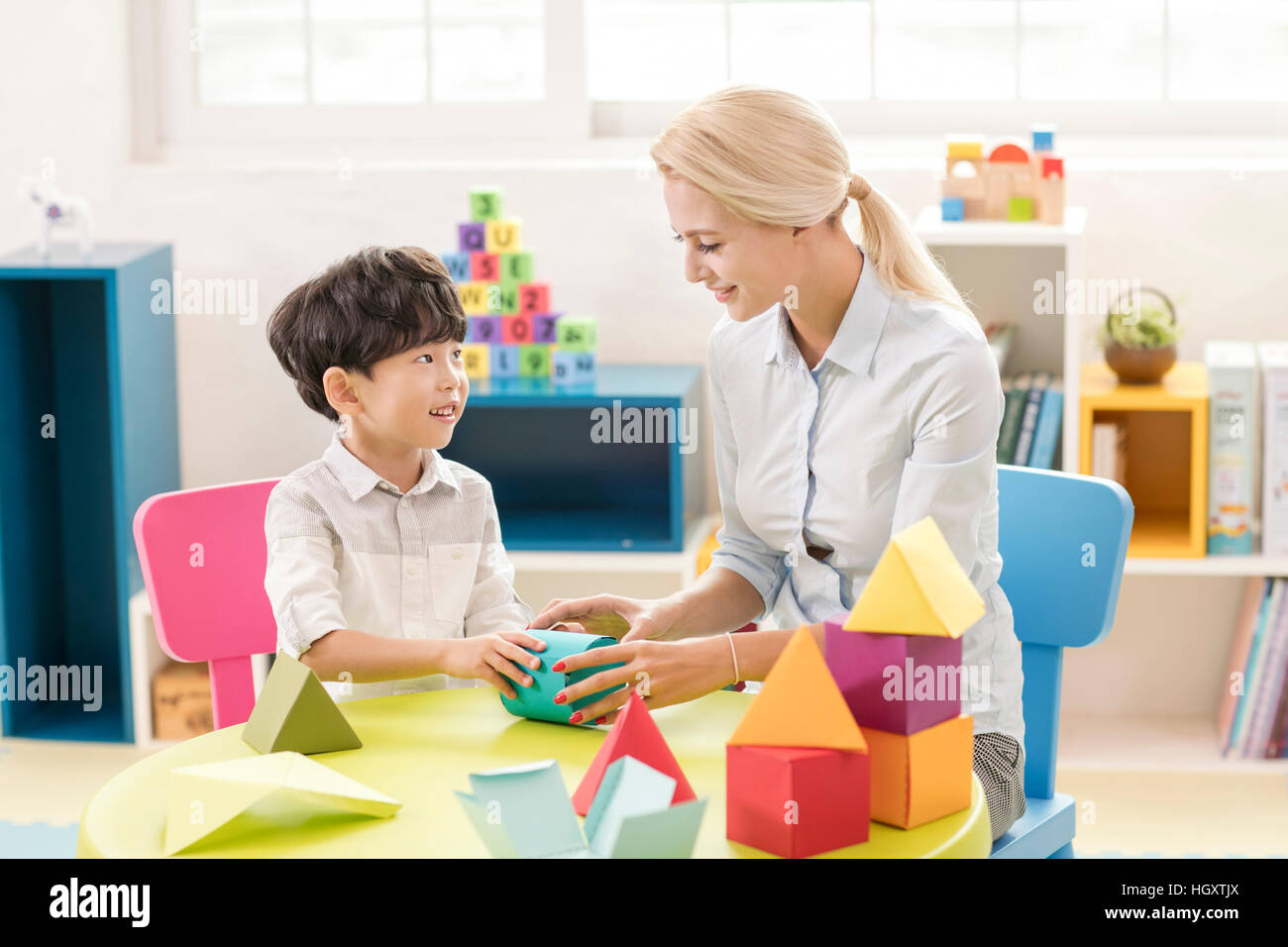 Boy with teacher hi-res stock photography and images - Alamy