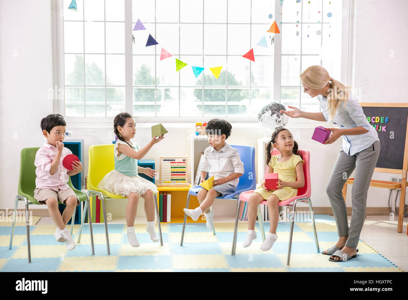 English class at kindergarten Stock Photo - Alamy