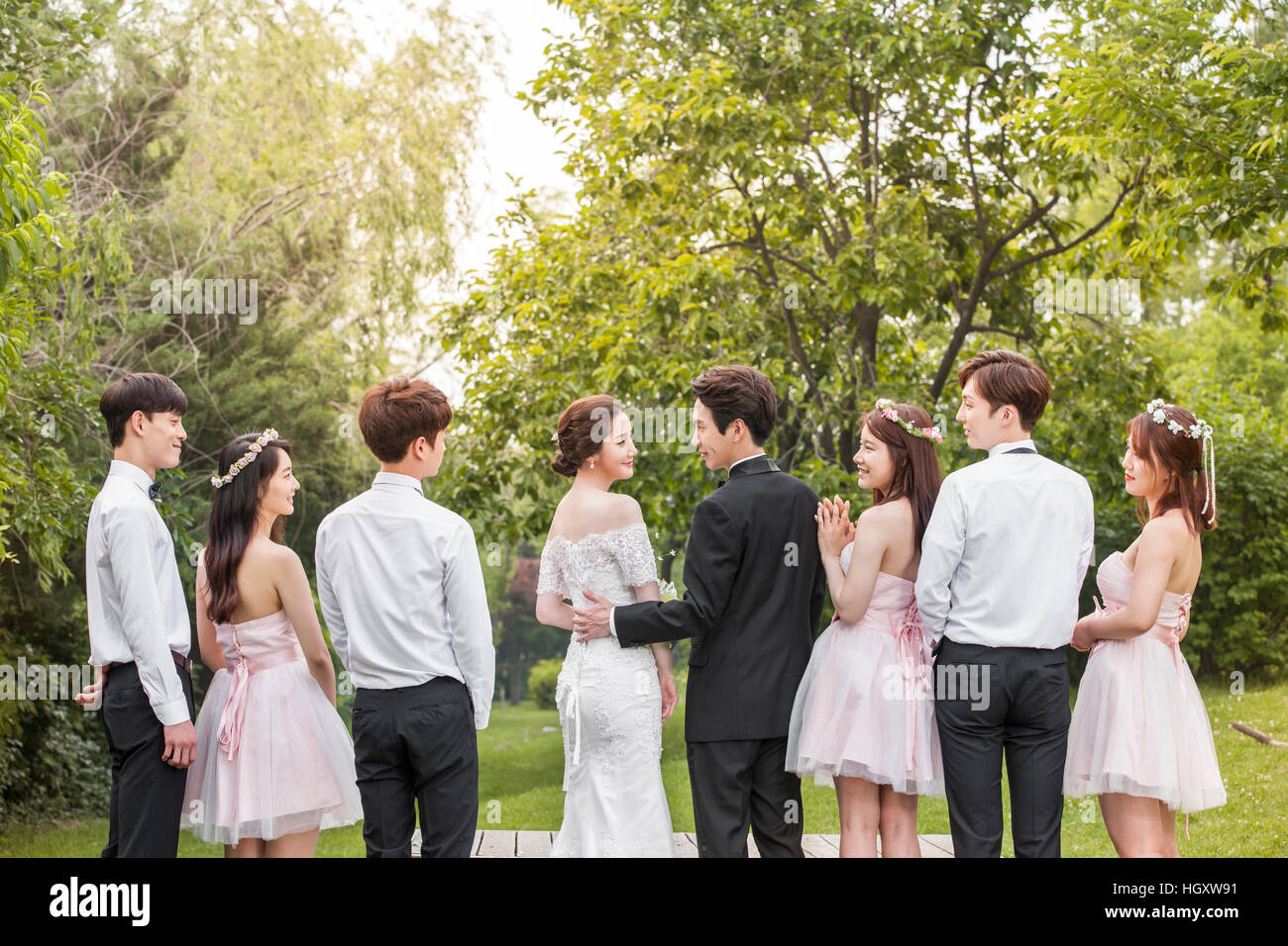 Romantic wedding couple and their friends Stock Photo - Alamy