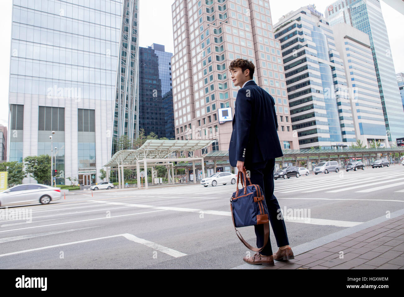 Adult male bus standing side view hi-res stock photography and images ...