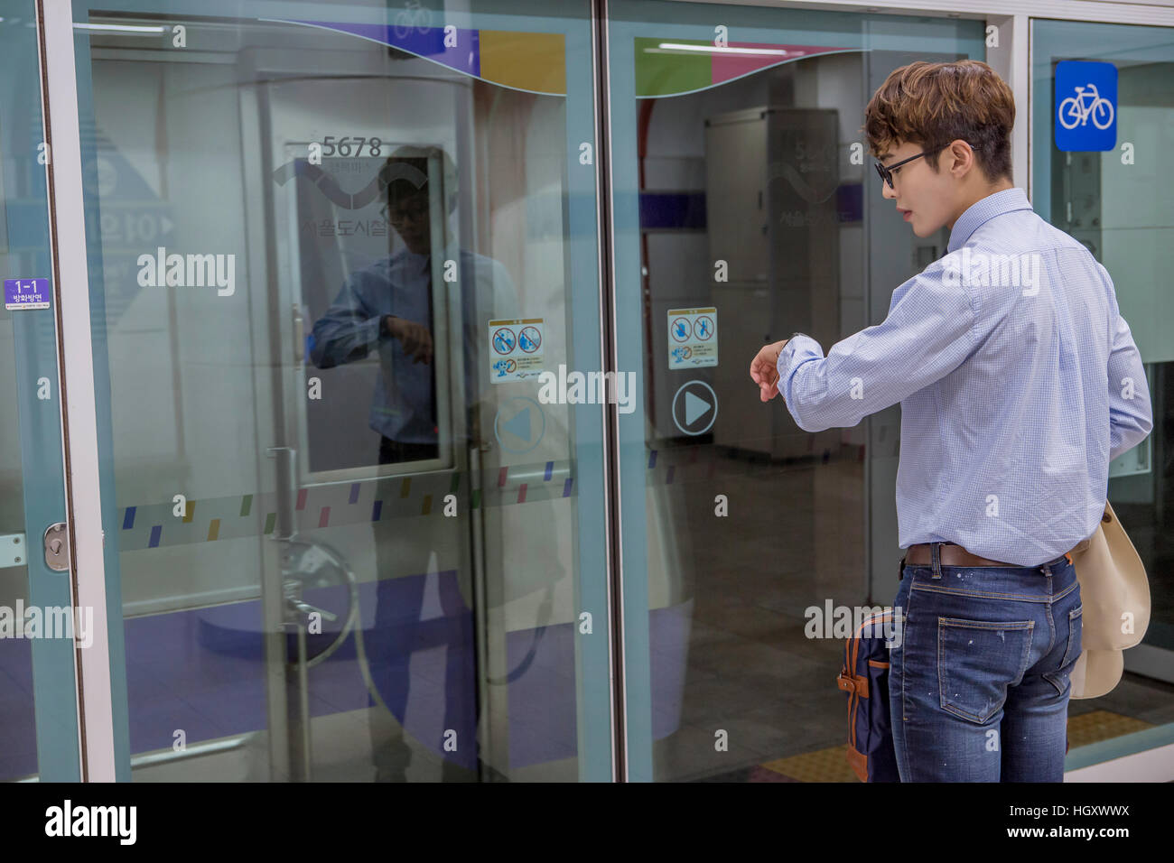 Waiting middle aged man checking hi-res stock photography and images ...