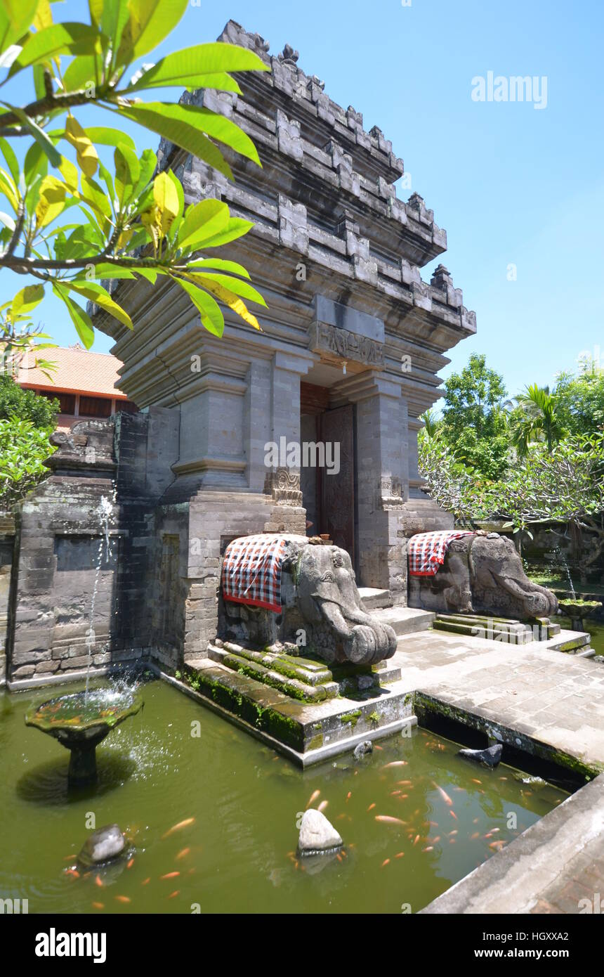 Stone gate with elephant sculptures at Batuan temple, Bali, Indonesia ...