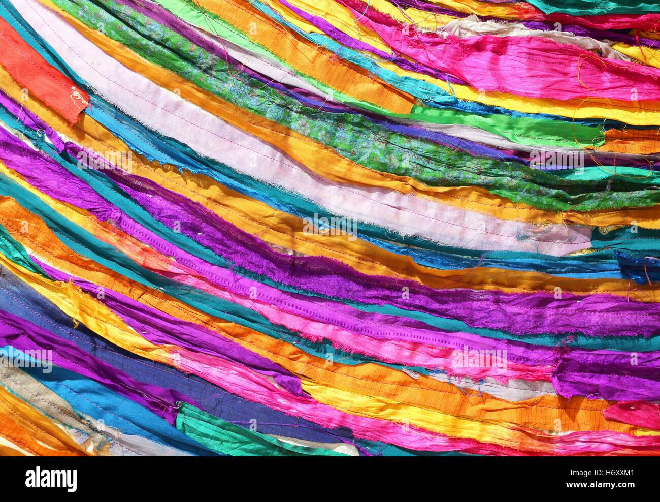 colored background of many fabrics of cotton and synthetic Stock Photo ...