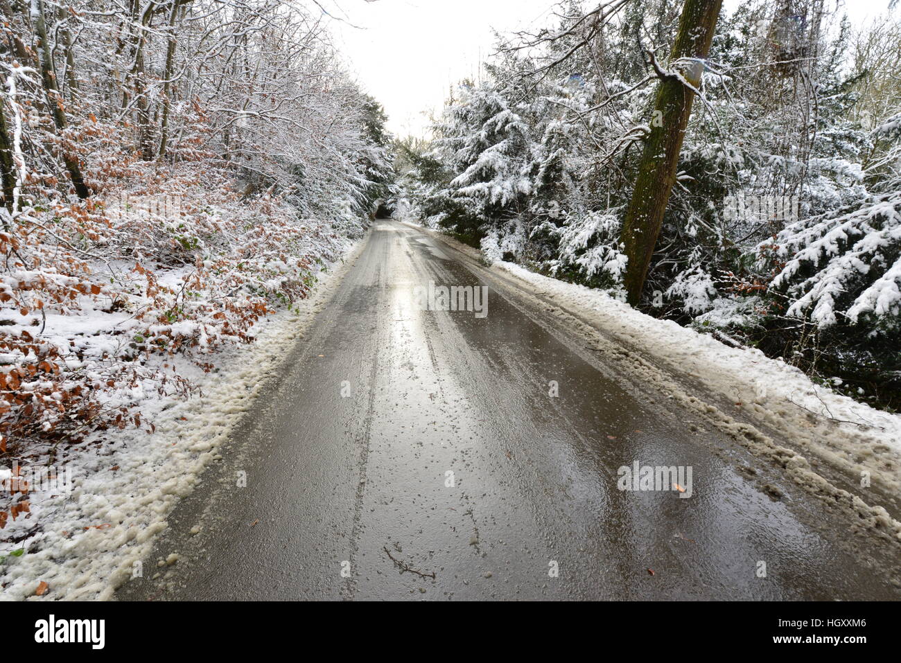 A Road in England after a snow storm in the morning Stock Photo - Alamy