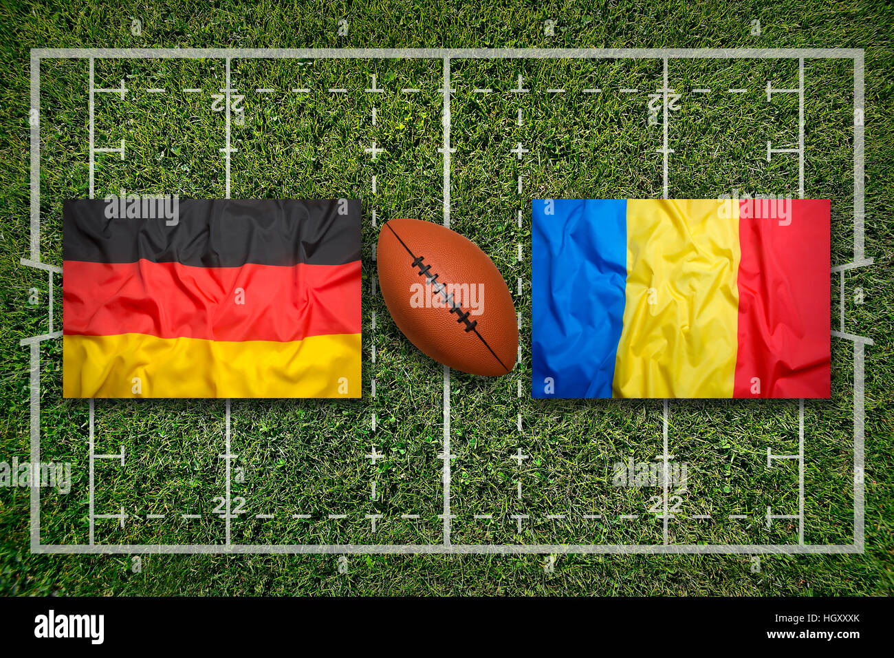 Germany vs. Romania flags on green rugby field Stock Photo - Alamy