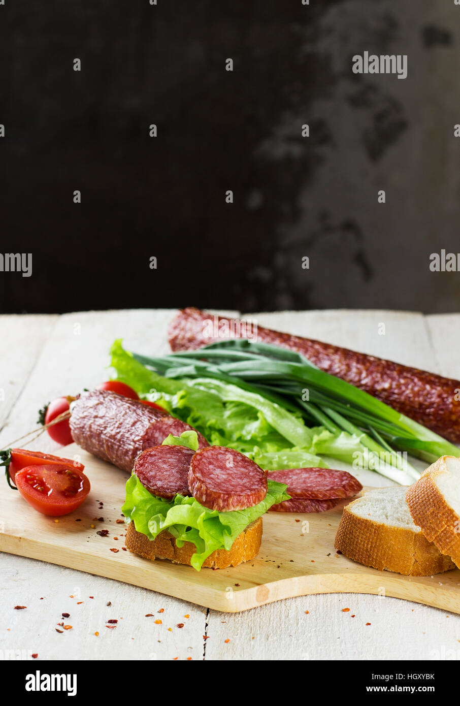 sausage, sandwich with lettuce and slices of sausage, tomatoes Stock ...