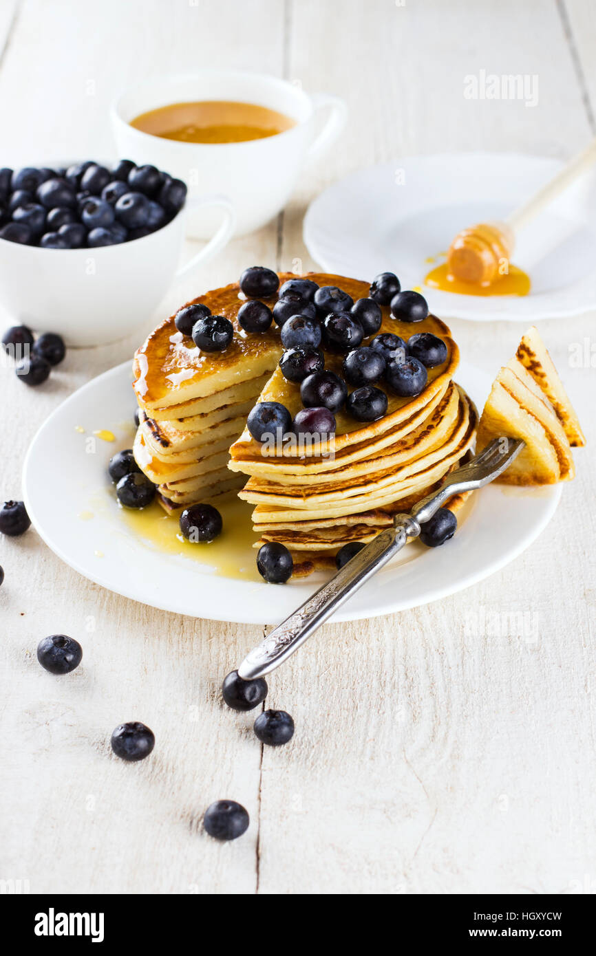 heap of pancakes the triangular slices of pancakes watered with honey ...
