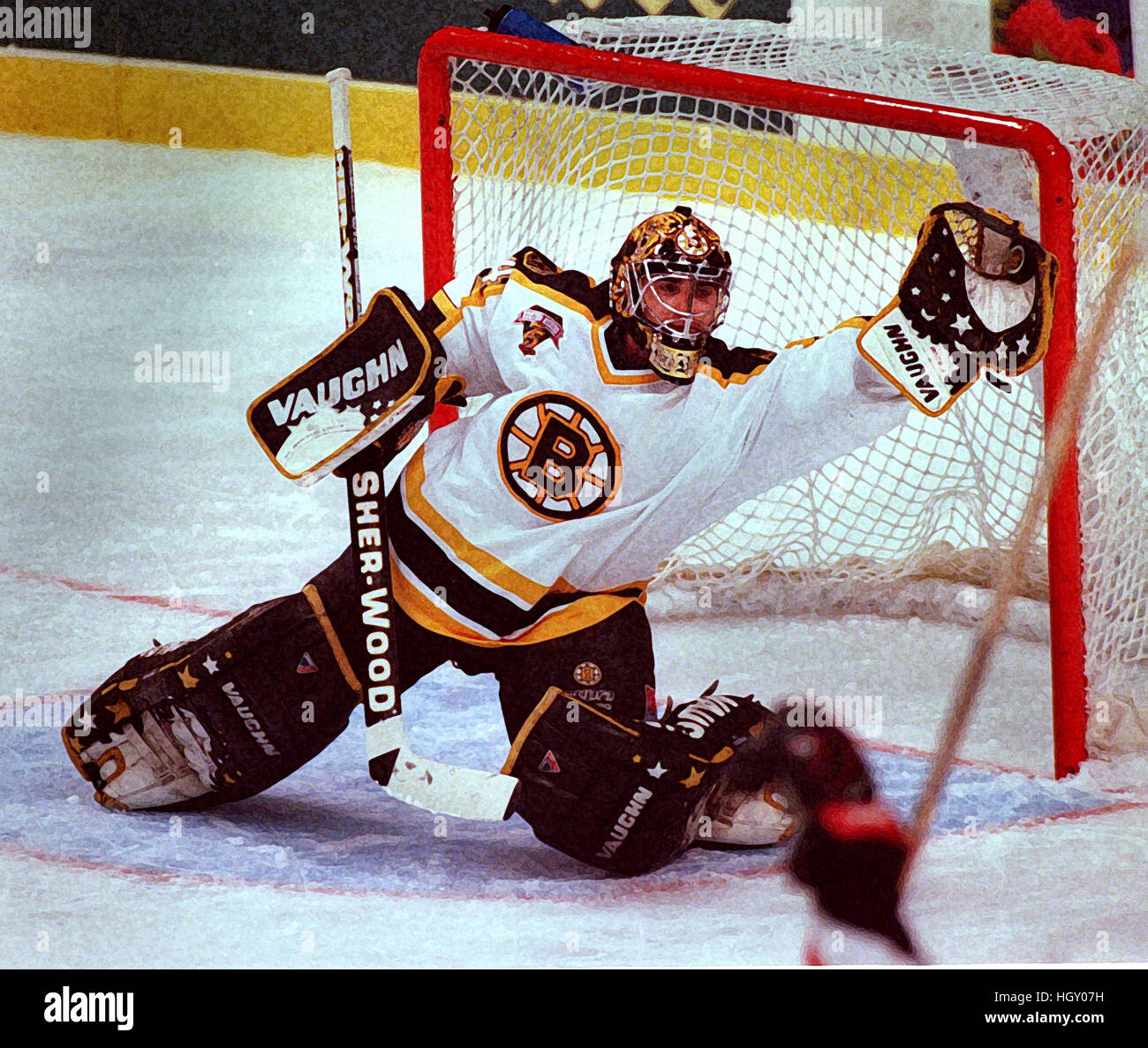 BYRON DAFOE MAKES A SAVE IN SECOND PERIOD ACTION AGAINST THE SENATORS ...