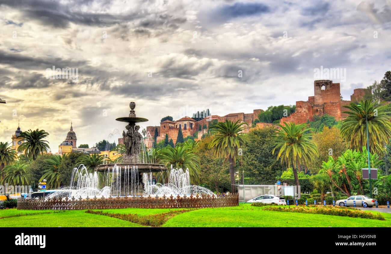Tres Gracias Fountain and Alcazaba Castle in Malaga - Adalusia, Spain ...