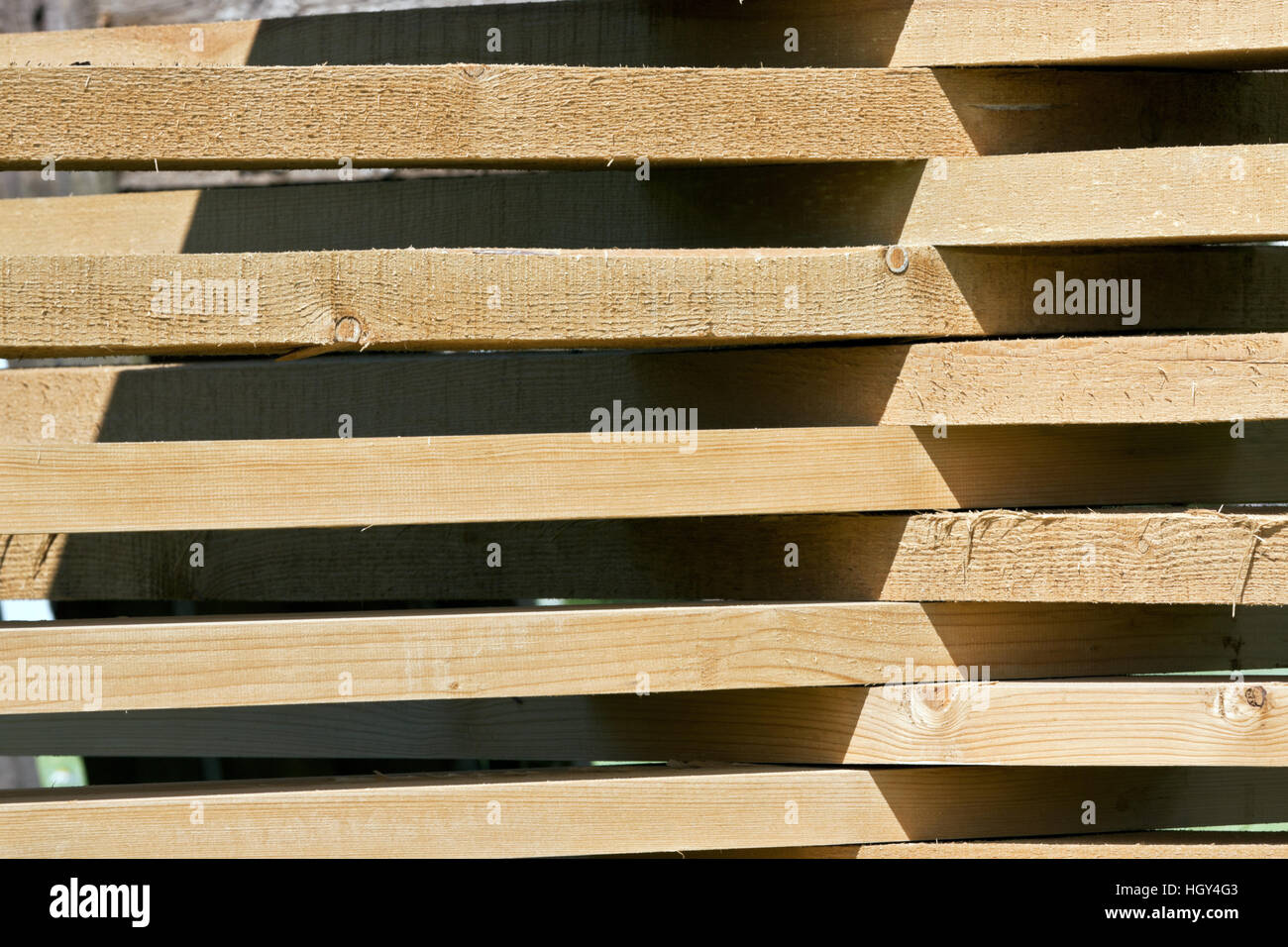 Stacks of boards at construction site Stock Photo - Alamy