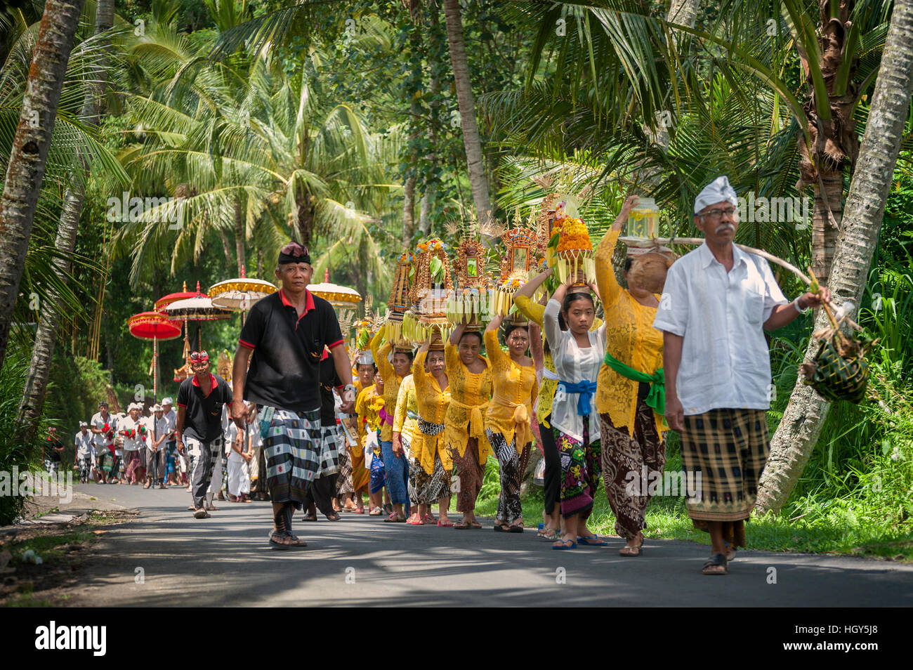 Balinese Hindu Procession. In Bali Hindu religious events are commonly ...