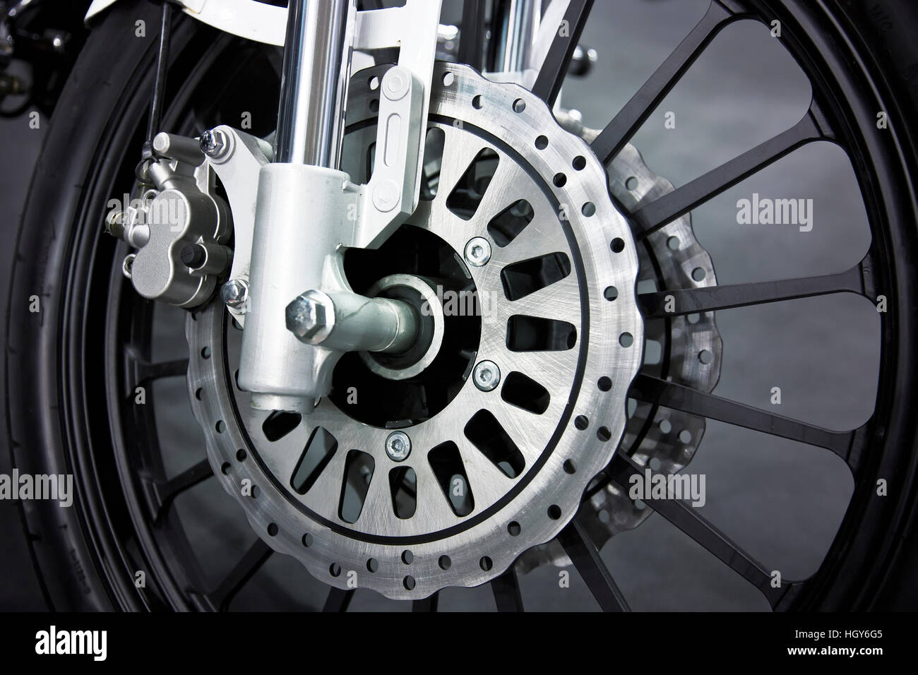 a wheel of a motorcycle with disk brake Stock Photo - Alamy