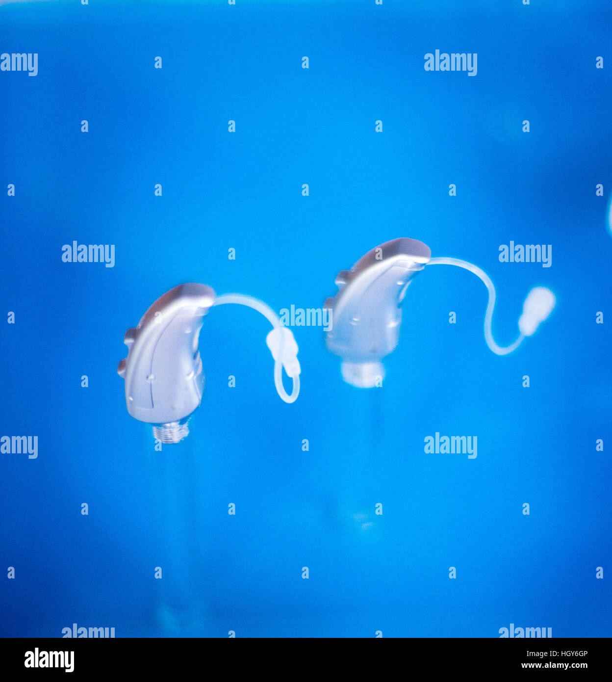 Modern high technology digital hearing aids in retail store shop window ...