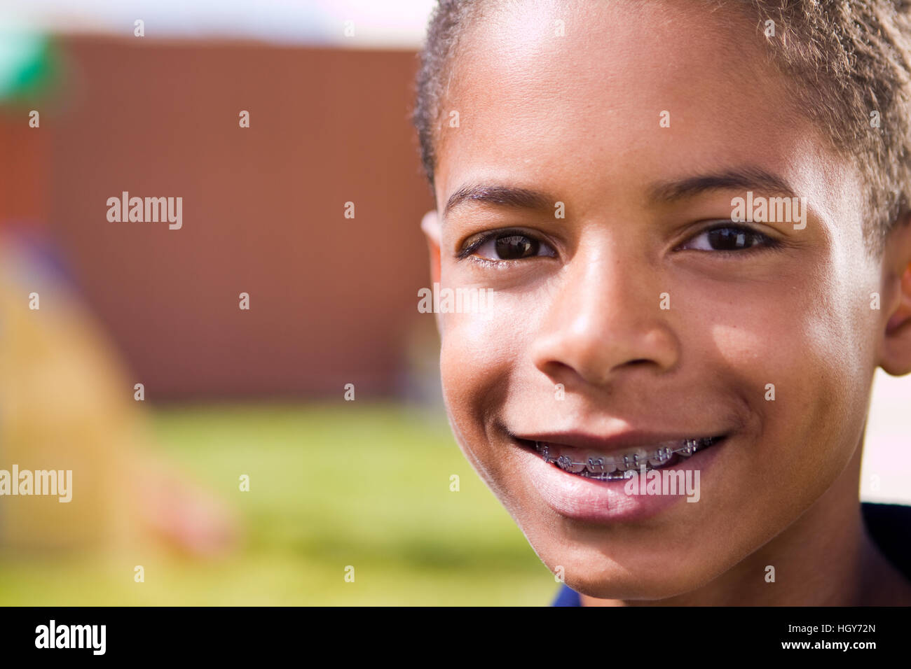 Happy African American boy with open arms Stock Photo - Alamy