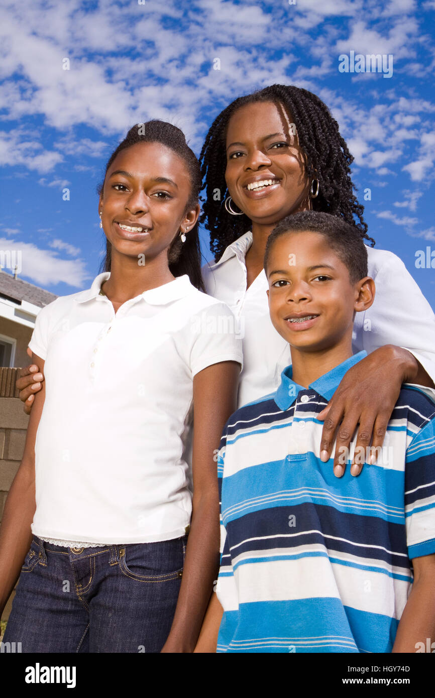 Happy African American mother and her children Stock Photo - Alamy