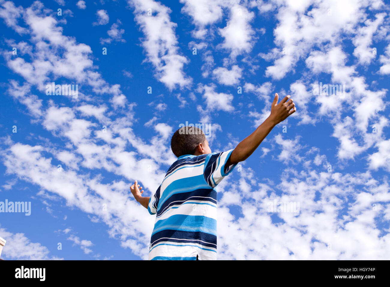Happy African American boy with open arms Stock Photo - Alamy