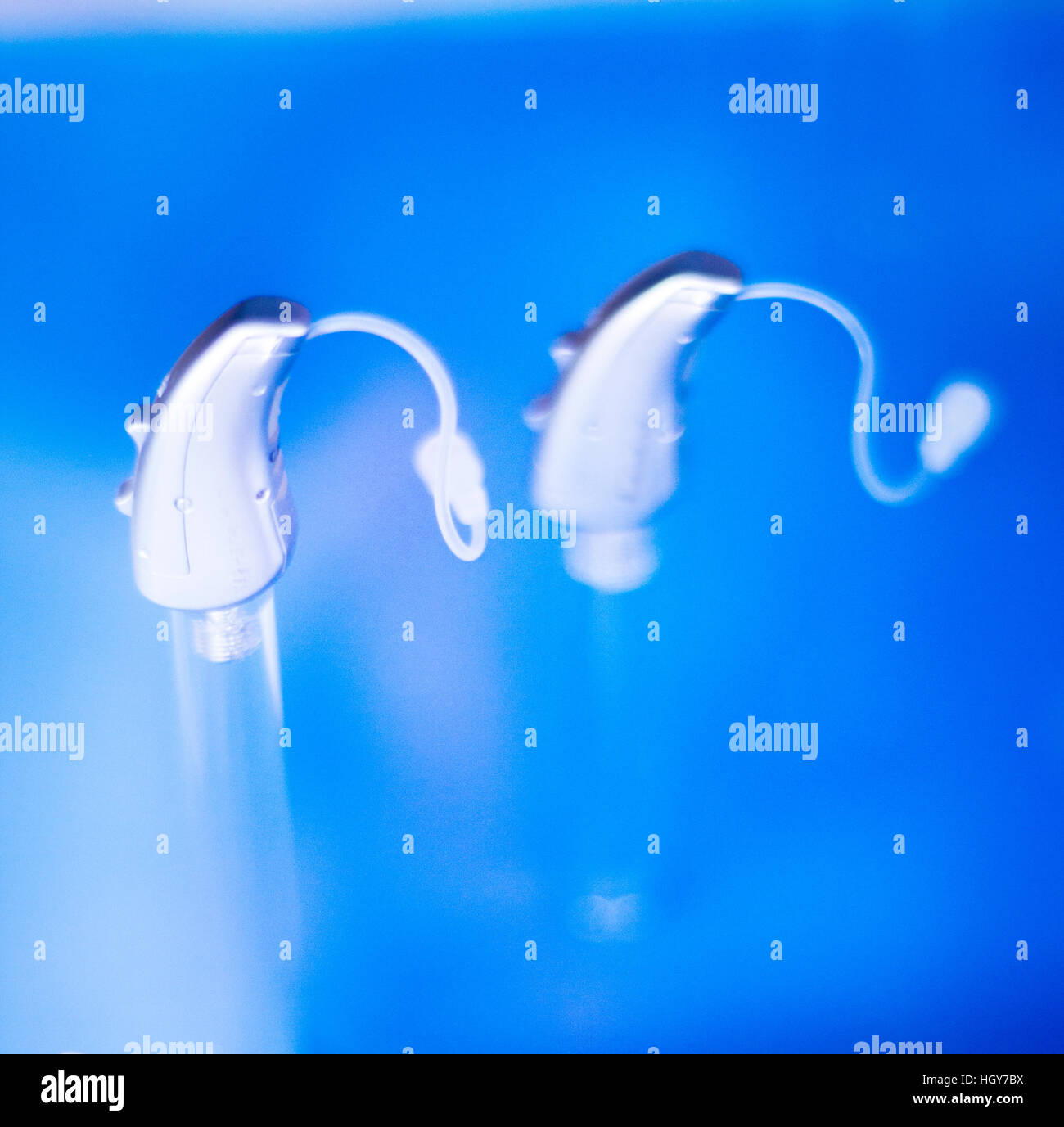 Modern high technology digital hearing aids in retail store shop window ...